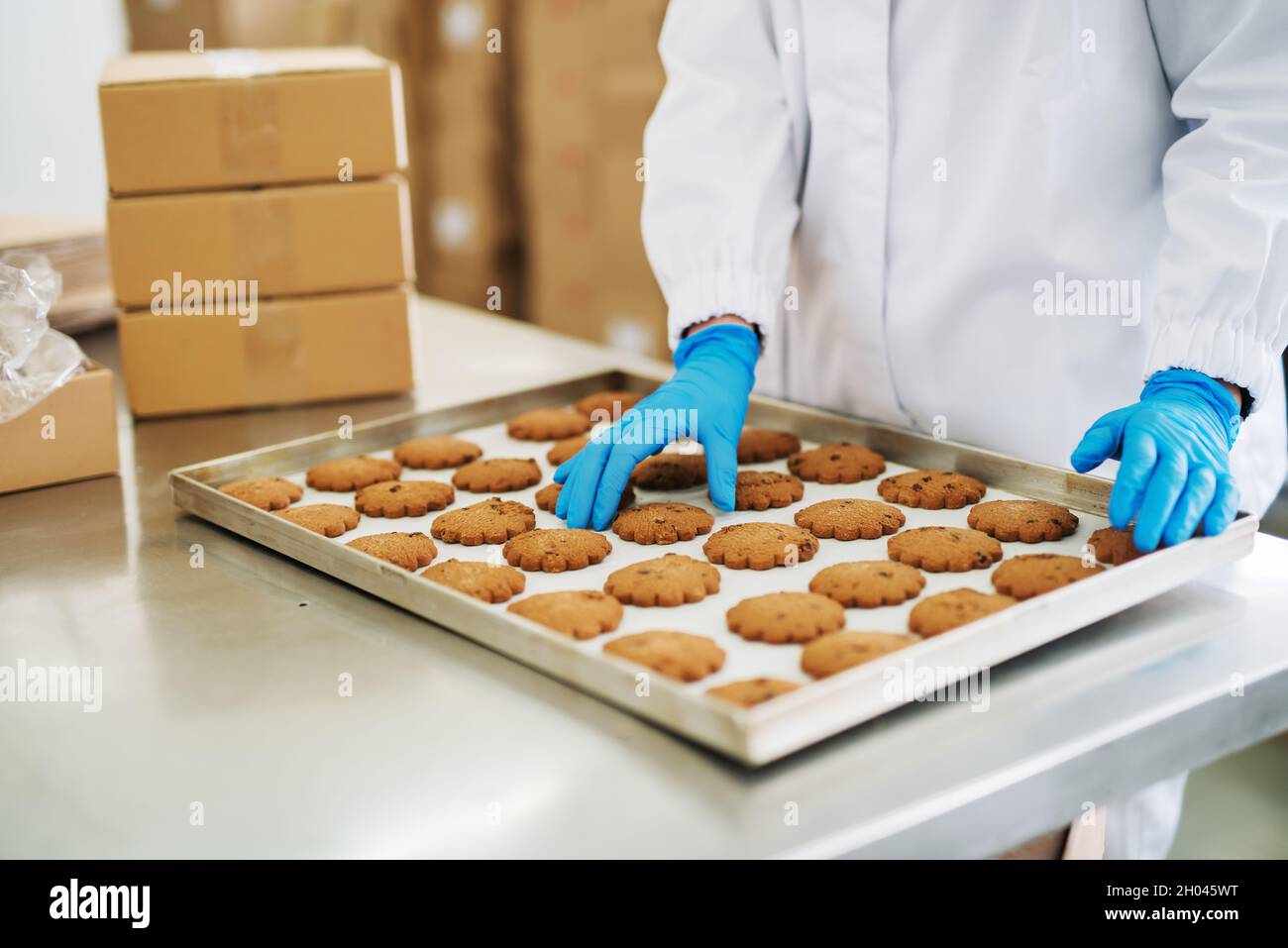 Industrial factory worker putting detail hi-res stock photography and ...