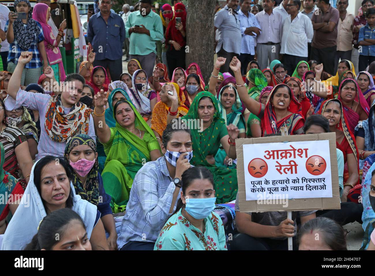 People shouts slogans in a protest rally in demand of justice for ...