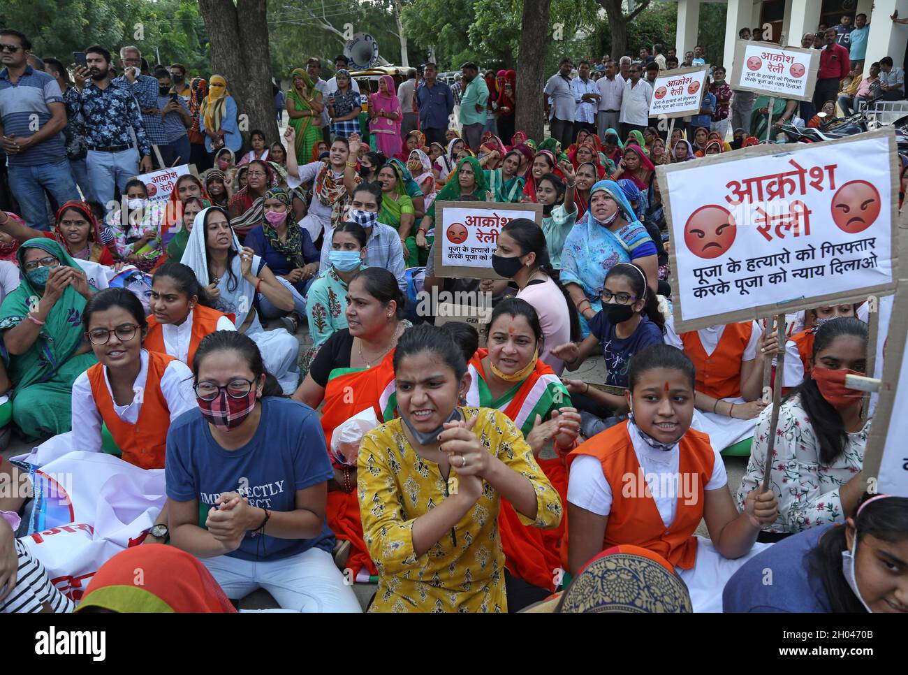 People shouts slogans in a protest rally in demand of justice for ...