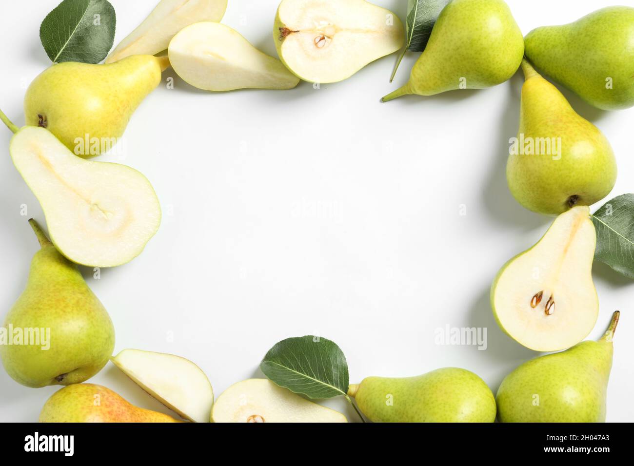 Frame made of pears on white background, top view Stock Photo - Alamy
