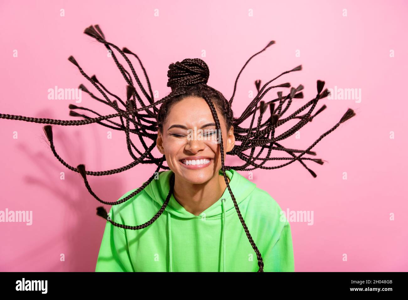 Photo of joyful young nice dark skin woman wind blow dreadlocks hair ...