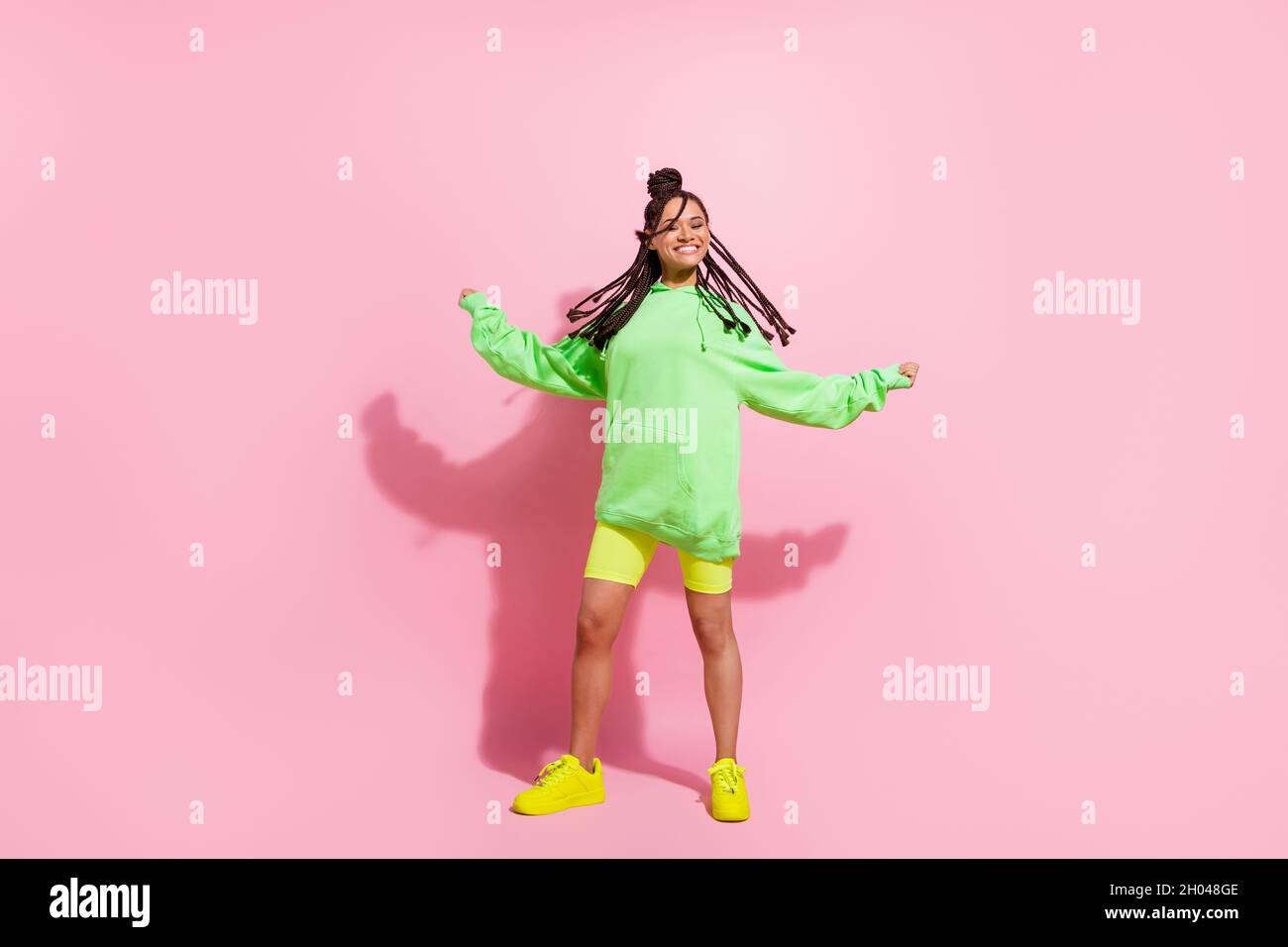 Full body photo of joyful dark skin young woman fly hair enjoy good ...