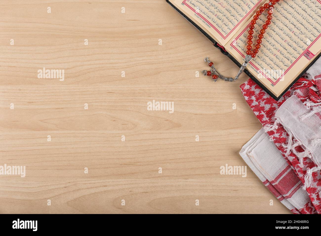 Flat lay composition with Muslim prayer beads, Quran and space for text ...
