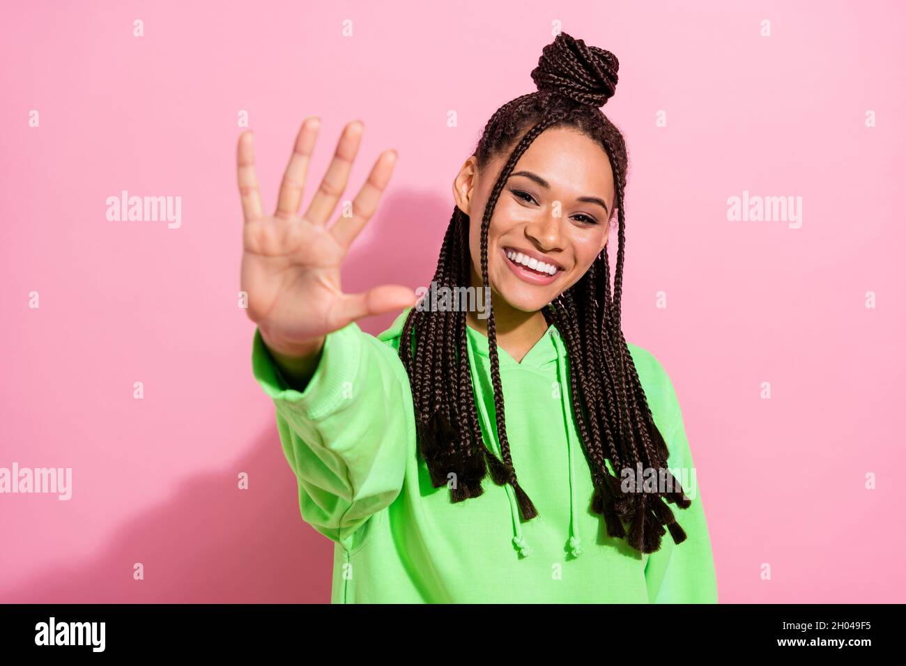 Photo of charming pretty dark skin young woman give high five smile ...