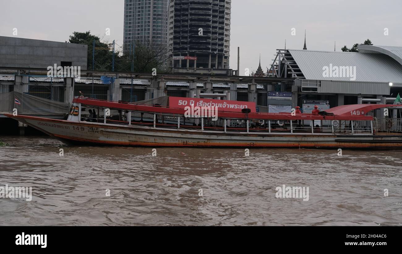 Sathorn Unique Tower at the Sathorn Pier Along the Chao Phraya River ...