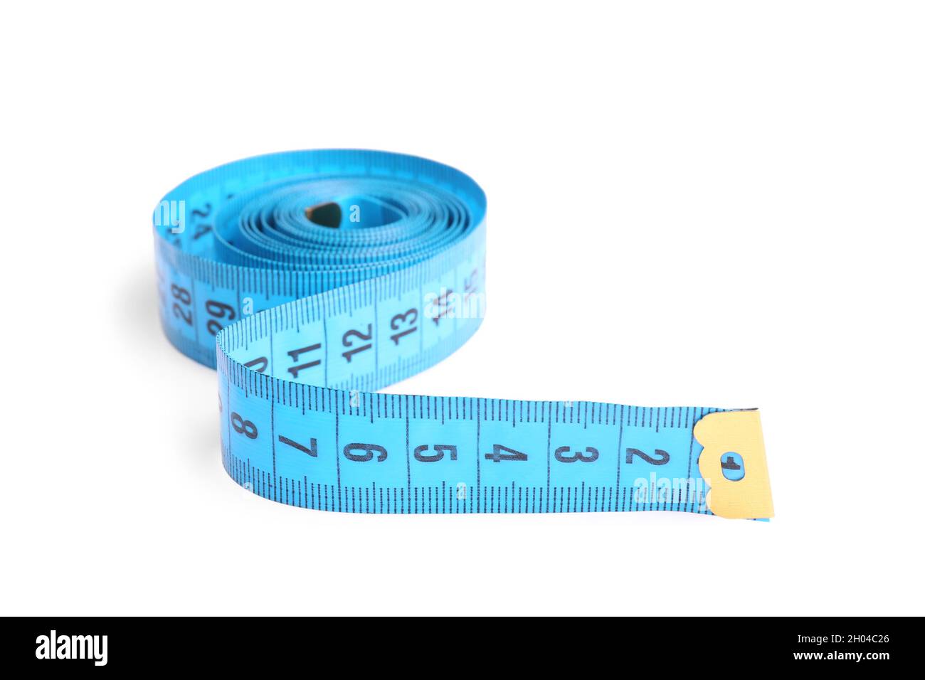 Measuring tape on white background Stock Photo - Alamy