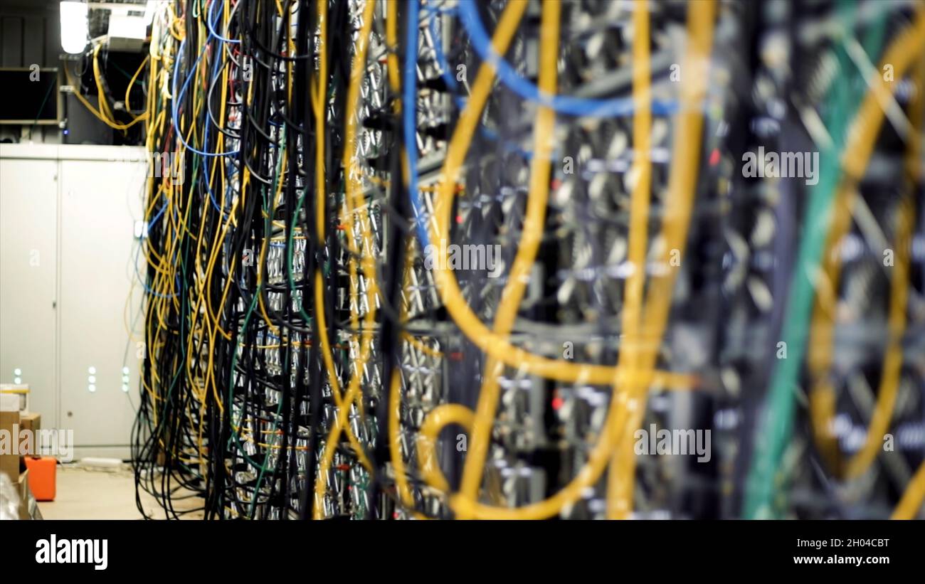 Multicolored data center wiring. Stock footage. Close-up of wall of ...