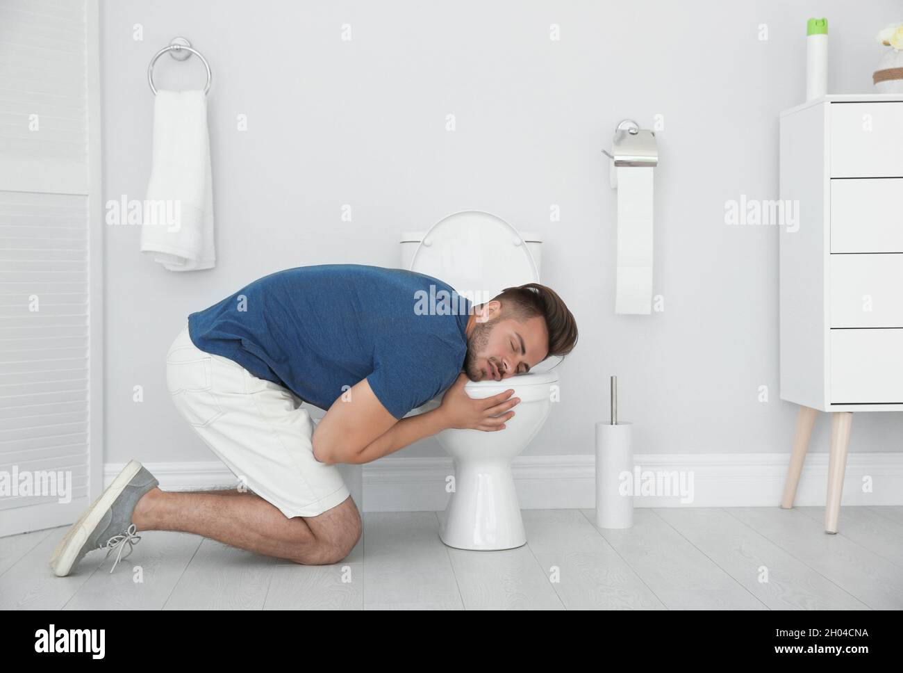 Man Vomiting Toilet High Resolution Stock Photography and Images - Alamy