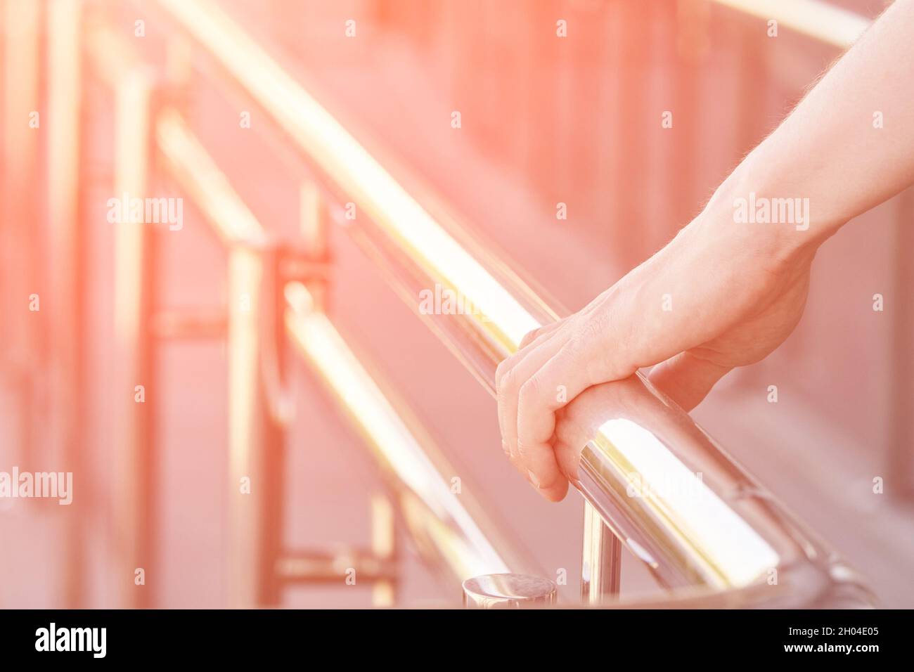 Hand using handrail for wheelchair. Man support Stock Photo - Alamy