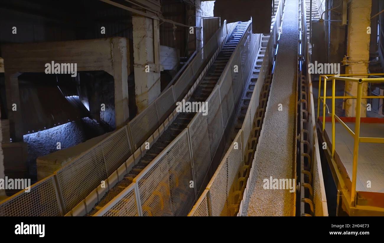 Conveyor belt at factory with powder raw materials. Stock footage ...