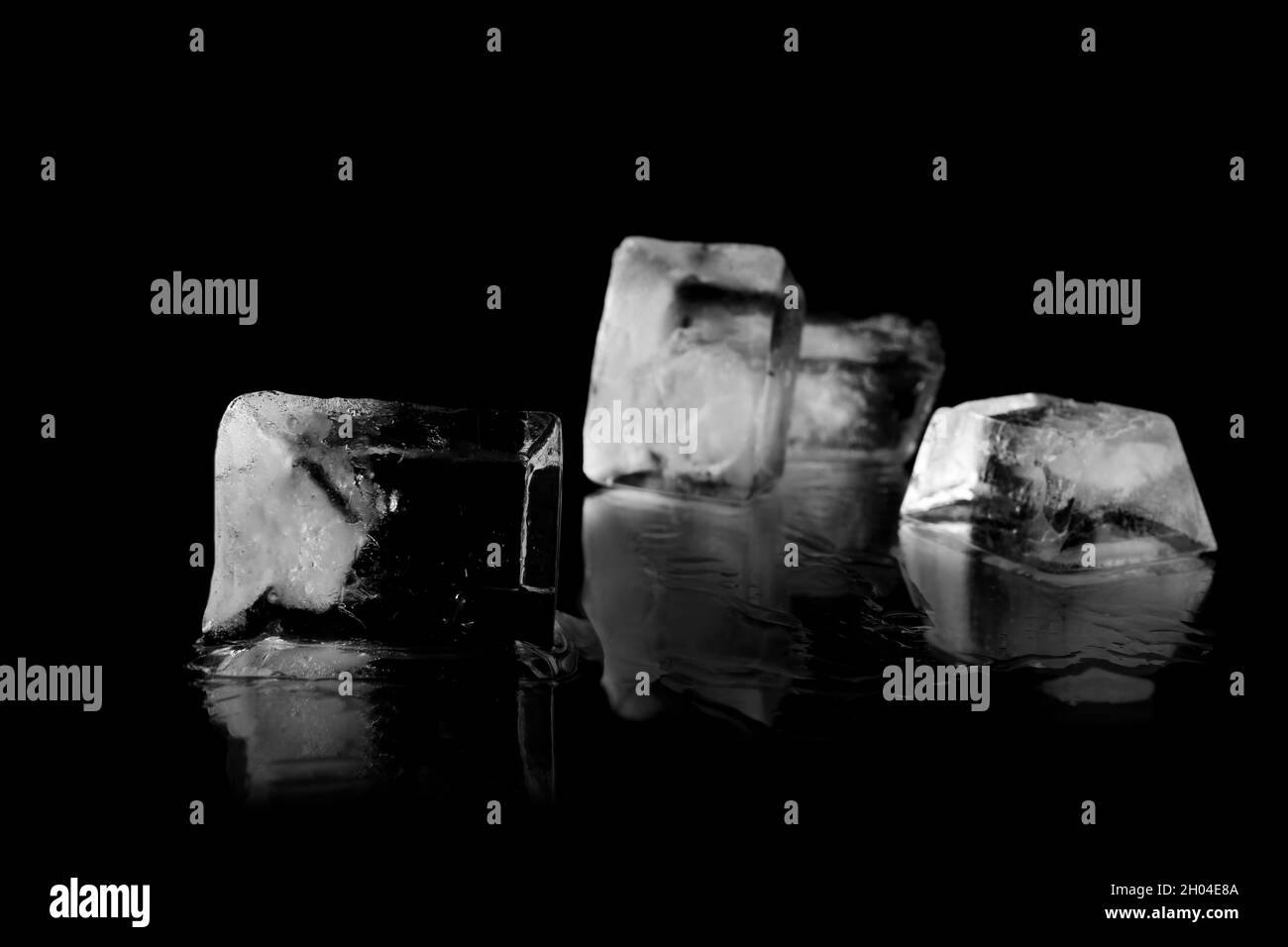 Transparent ice cubes on black mirror surface Stock Photo - Alamy