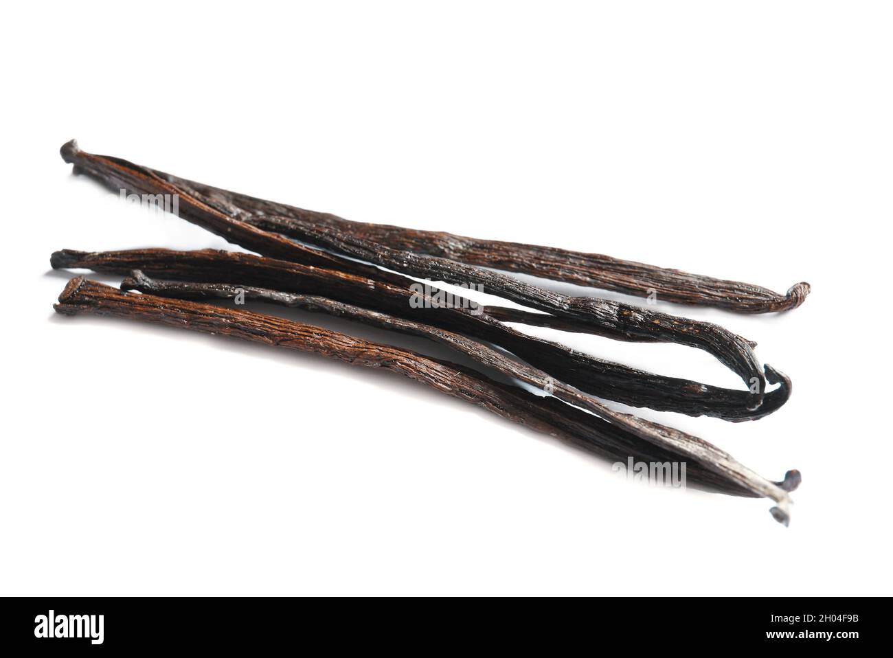 Aromatic vanilla sticks on white background Stock Photo - Alamy