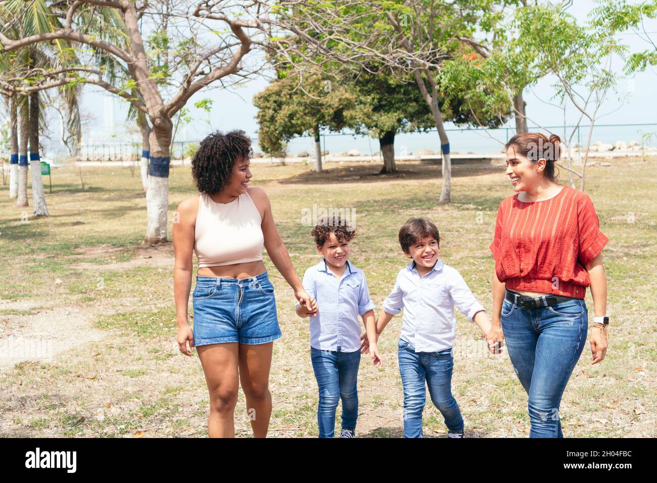 Hispanic boy walking hi-res stock photography and images - Alamy