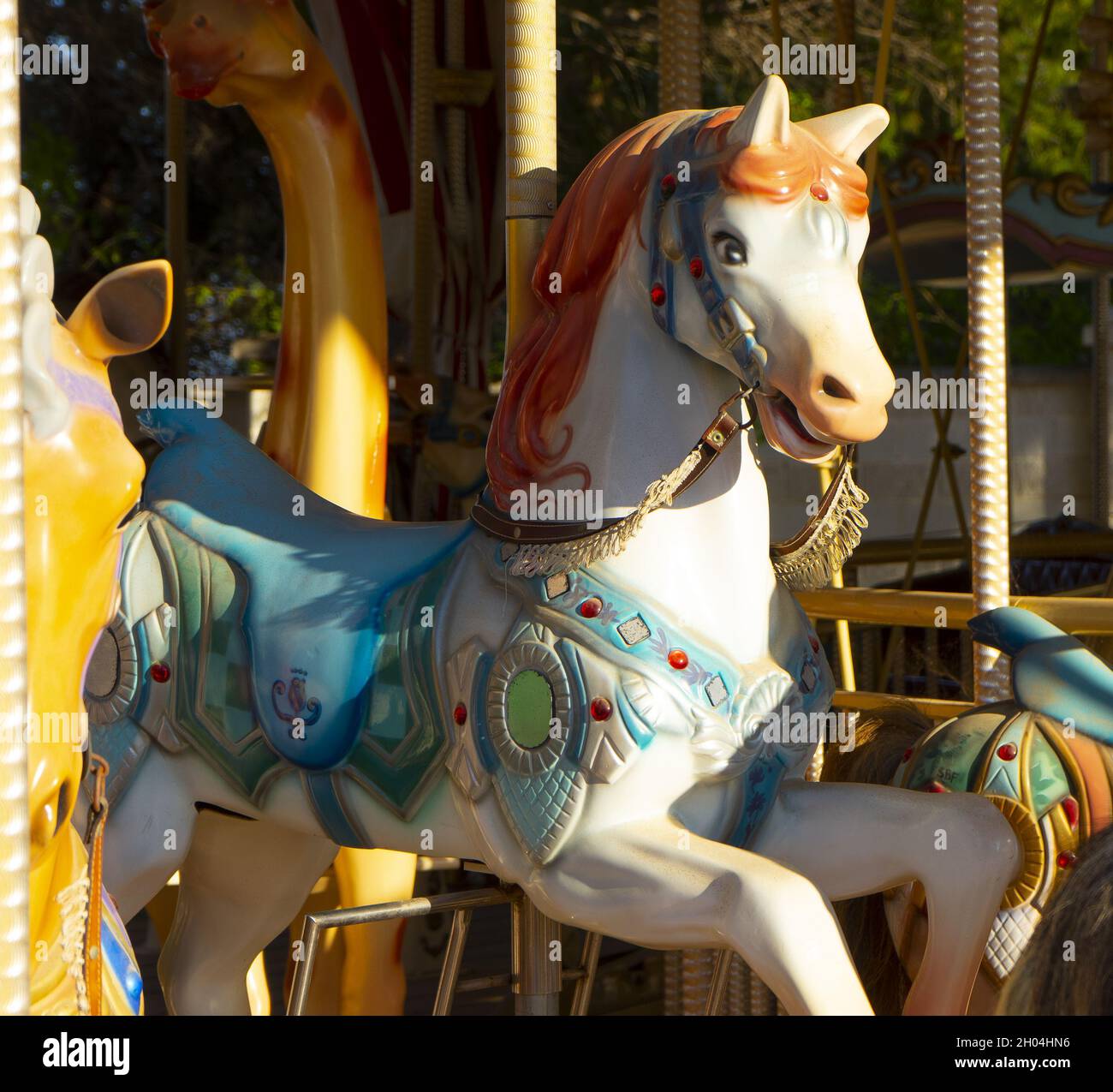 Children on funfair horse ride hi-res stock photography and images - Alamy