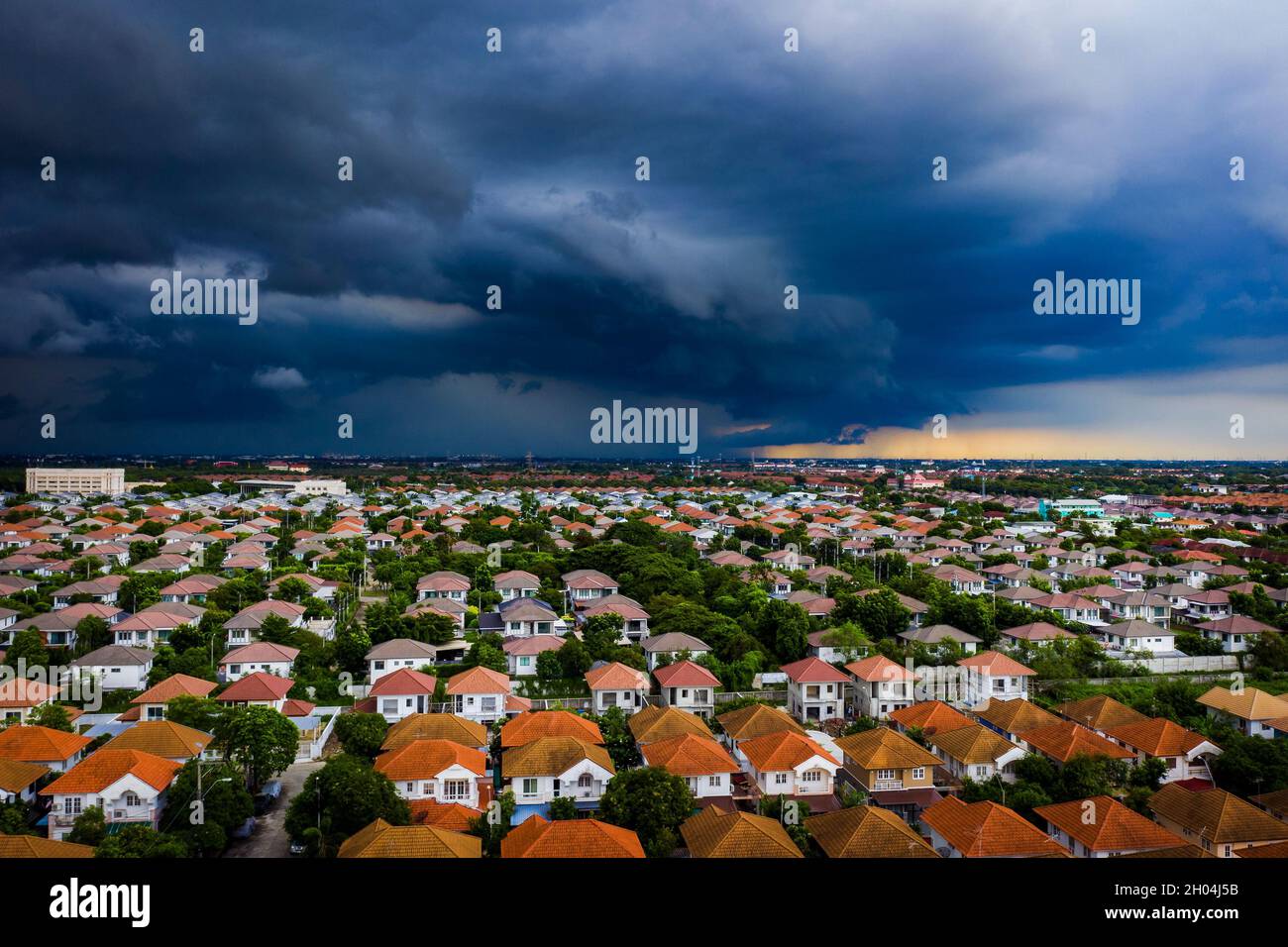 dark rainstorm over home village in bangkok thailand Stock Photo - Alamy