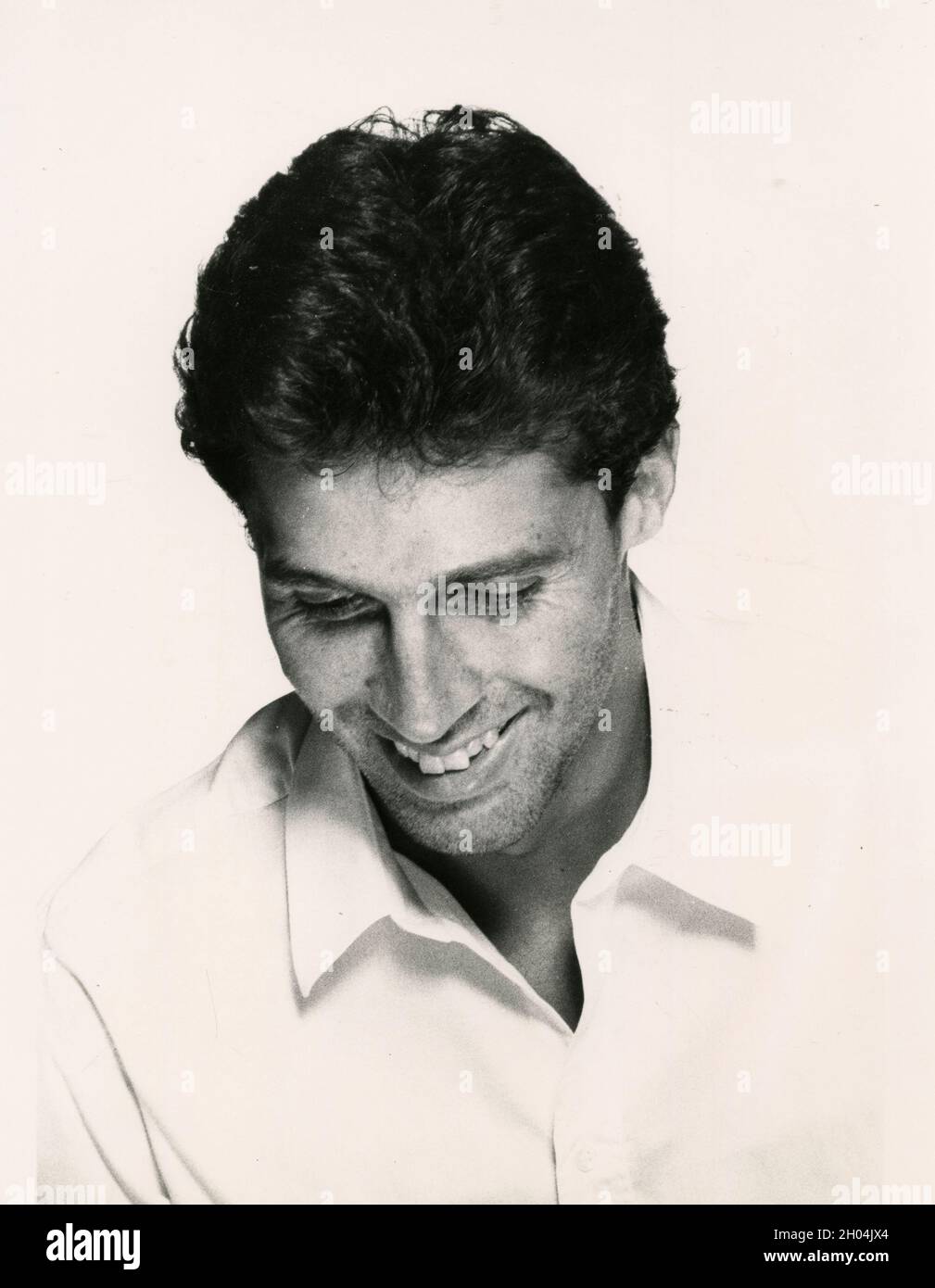 Italian singer and songwriter Luca Barbarossa, 1980s Stock Photo - Alamy