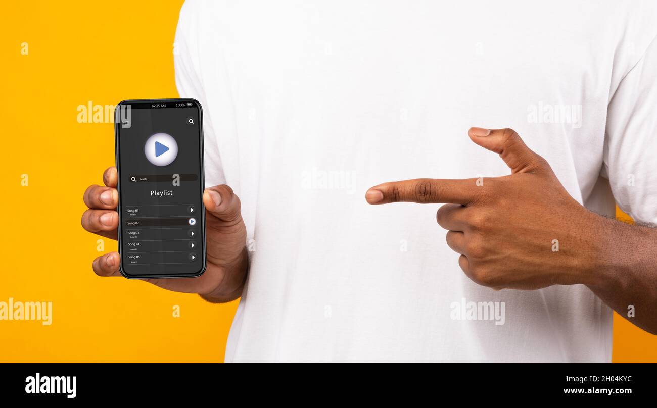 Unrecognizable Black Man Pointing At Music Player App Opened On Modern ...