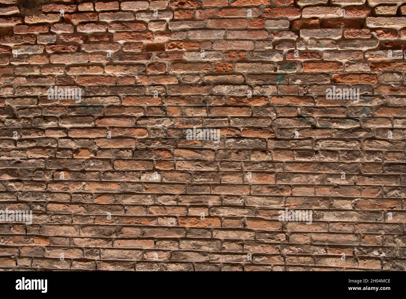 Brick wall structure of an old house Stock Photo - Alamy