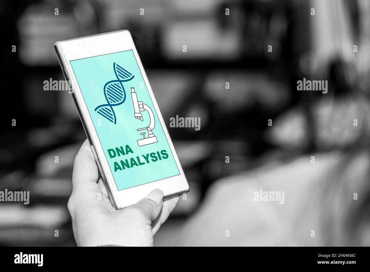 Smartphone screen displaying a dna analysis concept Stock Photo - Alamy