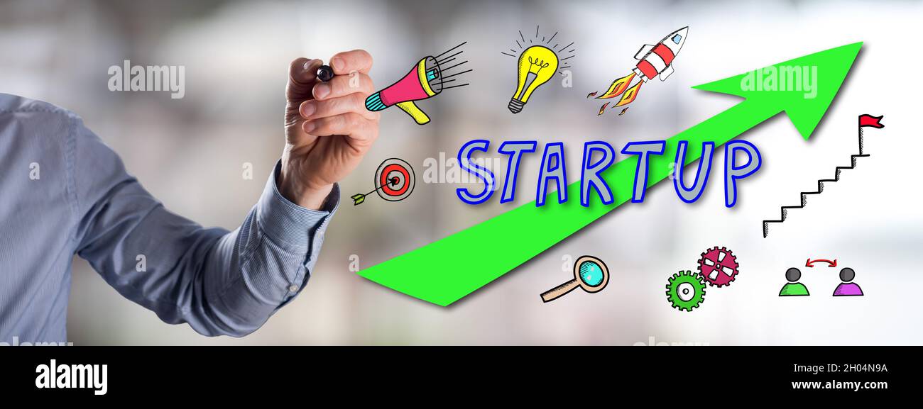 Man drawing a startup concept Stock Photo - Alamy