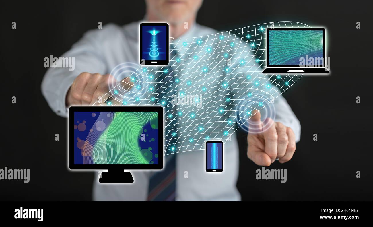 Man touching a device connection concept on a touch screen with his ...