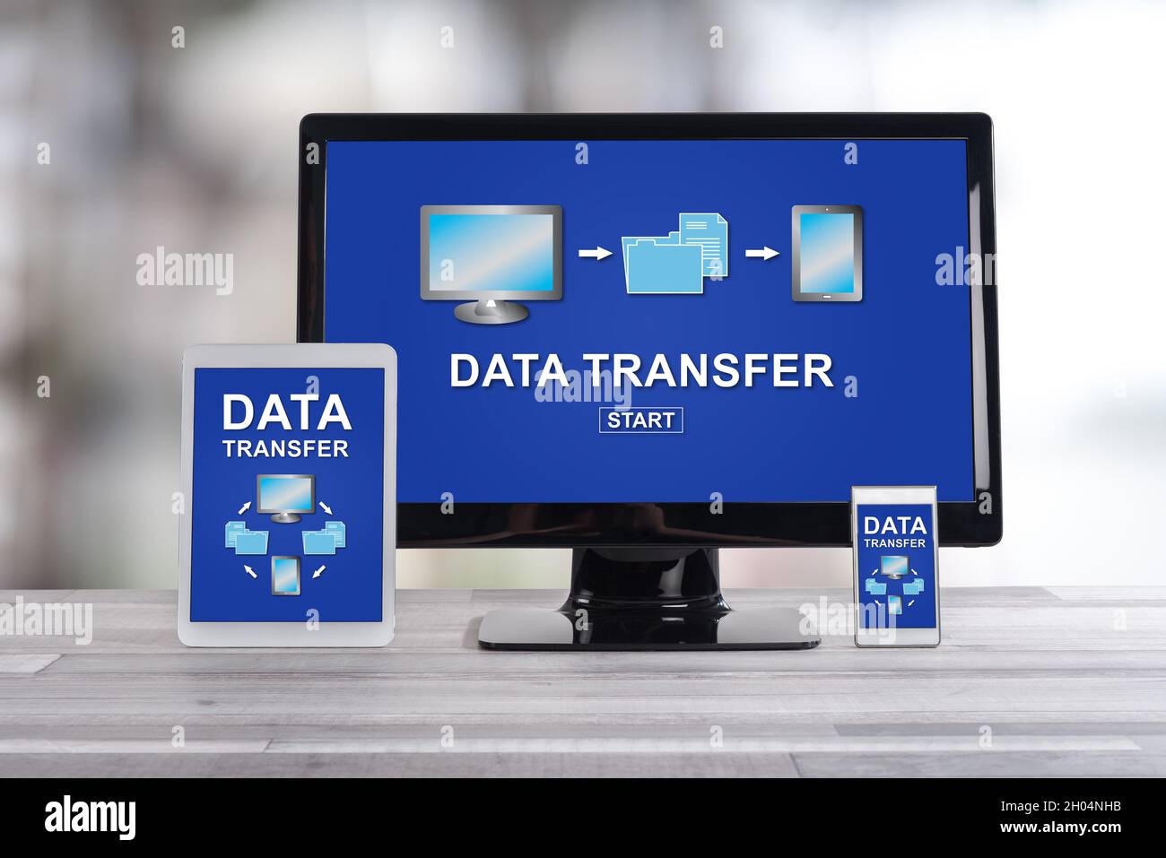 Data transfer concept shown on different information technology devices ...