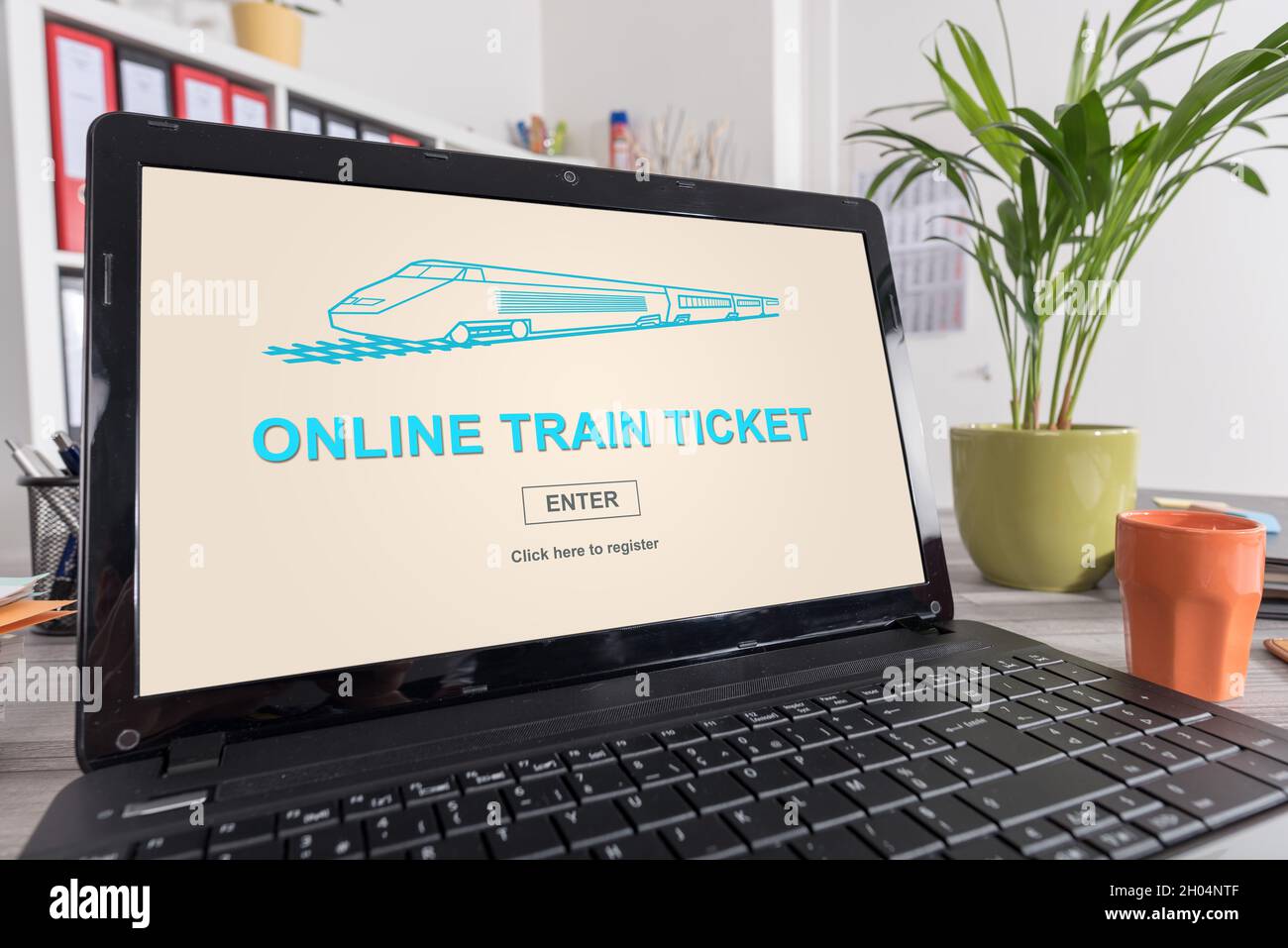Laptop screen with online train ticket concept Stock Photo - Alamy