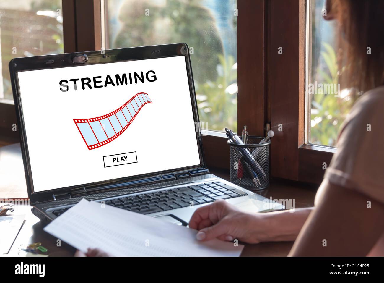 Laptop screen displaying a video streaming concept Stock Photo - Alamy