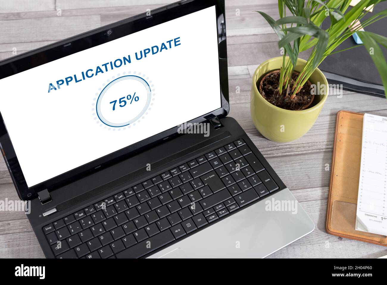 Laptop screen with application update concept Stock Photo - Alamy