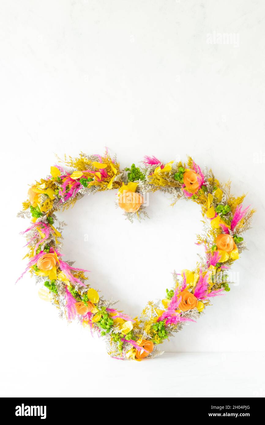 Colorful heart shaped flower arrangement Stock Photo - Alamy
