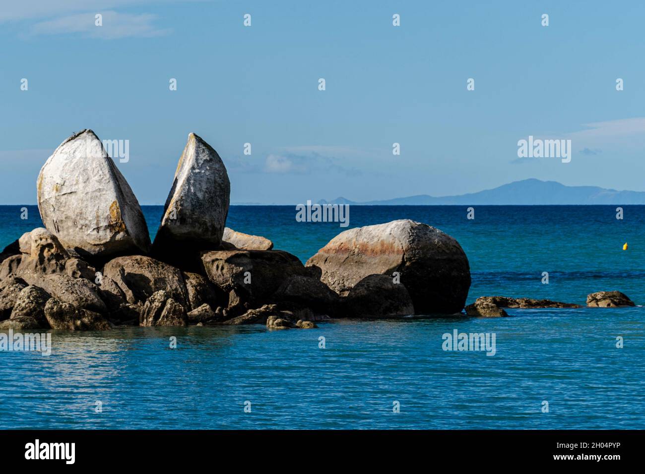 Split apple rock beach hi-res stock photography and images - Alamy