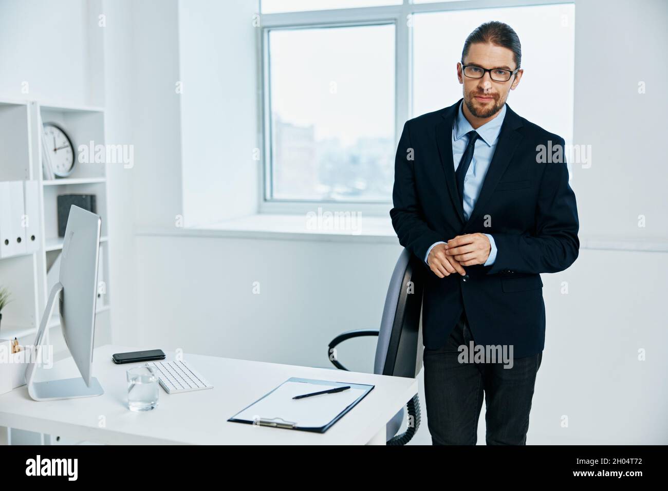 office worker near the desktop work process Lifestyle Stock Photo - Alamy
