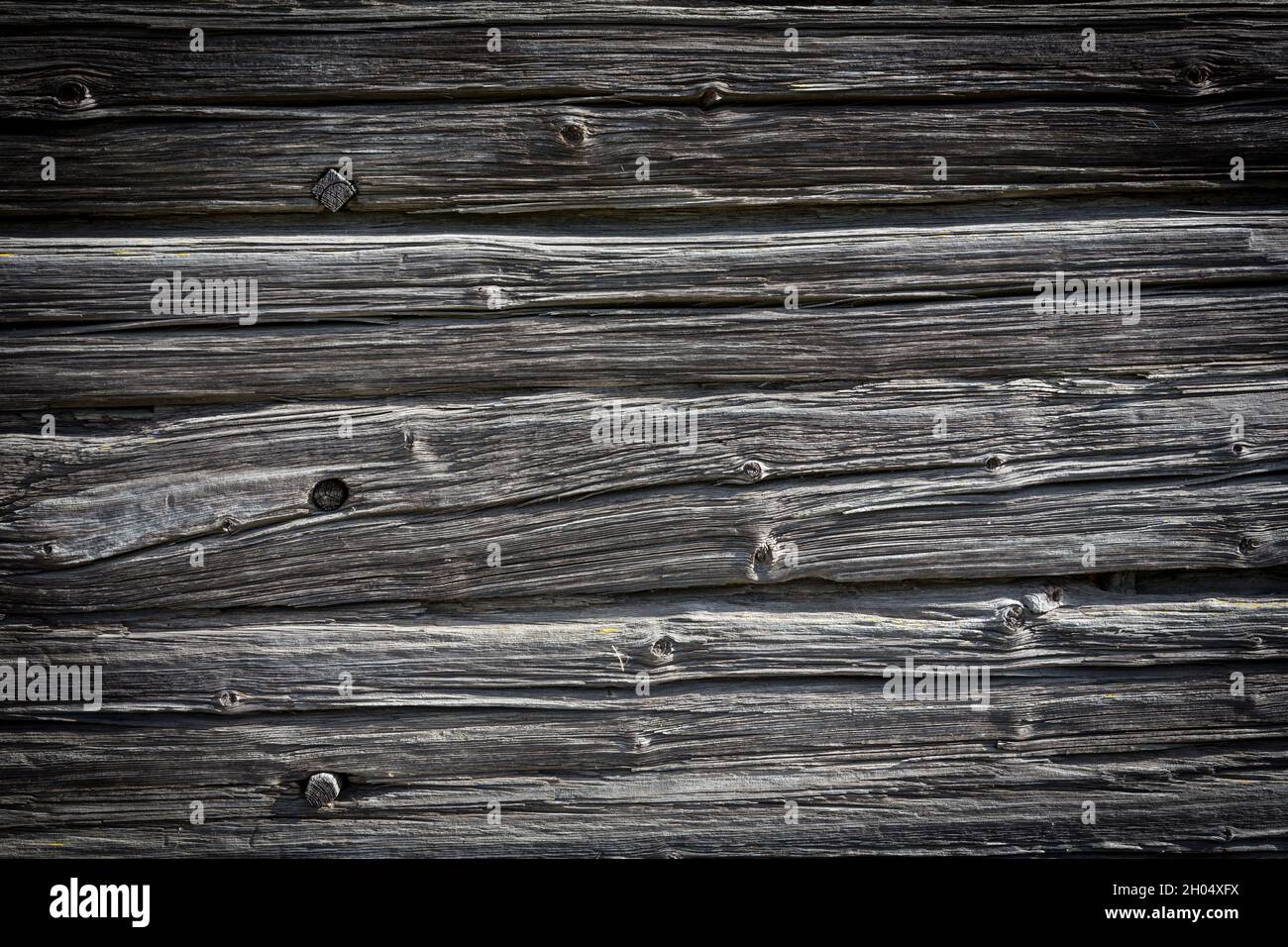 Wooden logs of an old house. Close-up. Weathered natural gray wood ...