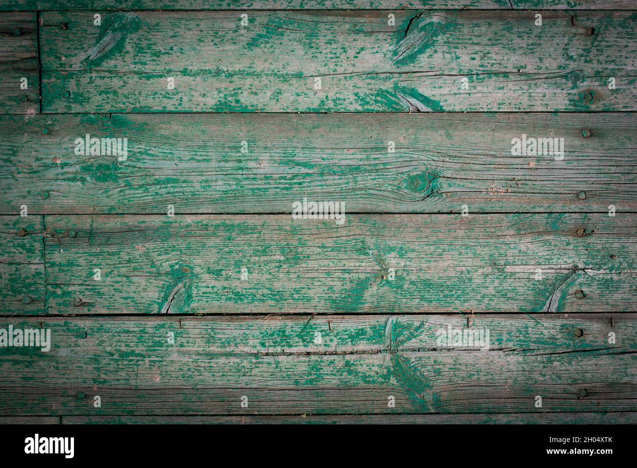 Wooden logs of an old house. Close-up. Weathered green wood texture ...