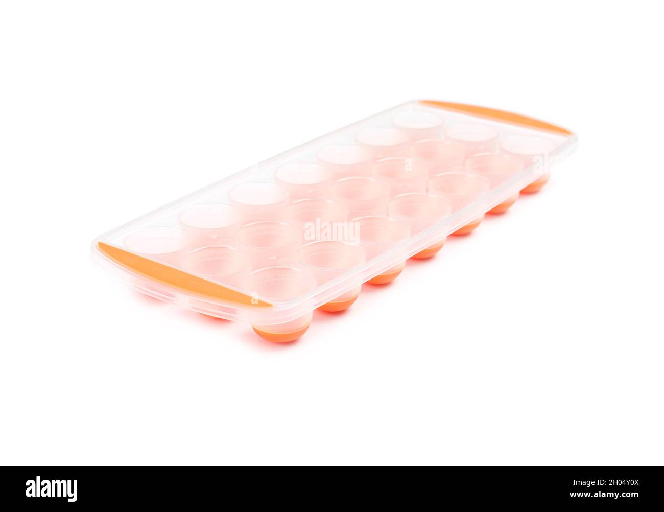 Empty ice cube tray on white background Stock Photo - Alamy
