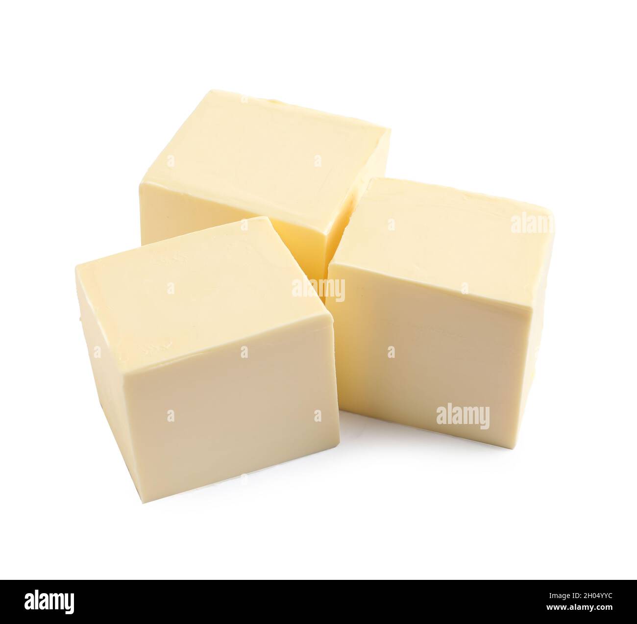 Cut butter on white background. Dairy product Stock Photo - Alamy