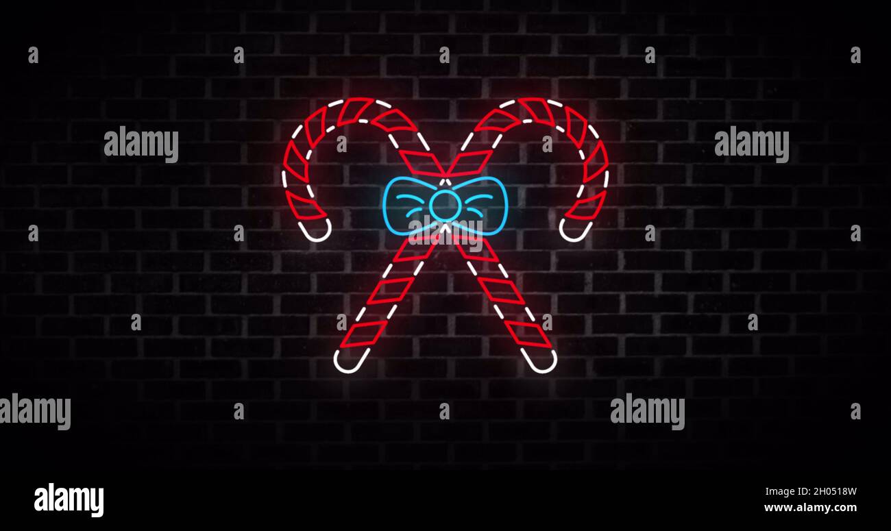 Image of neon christmas candies on black background Stock Photo - Alamy