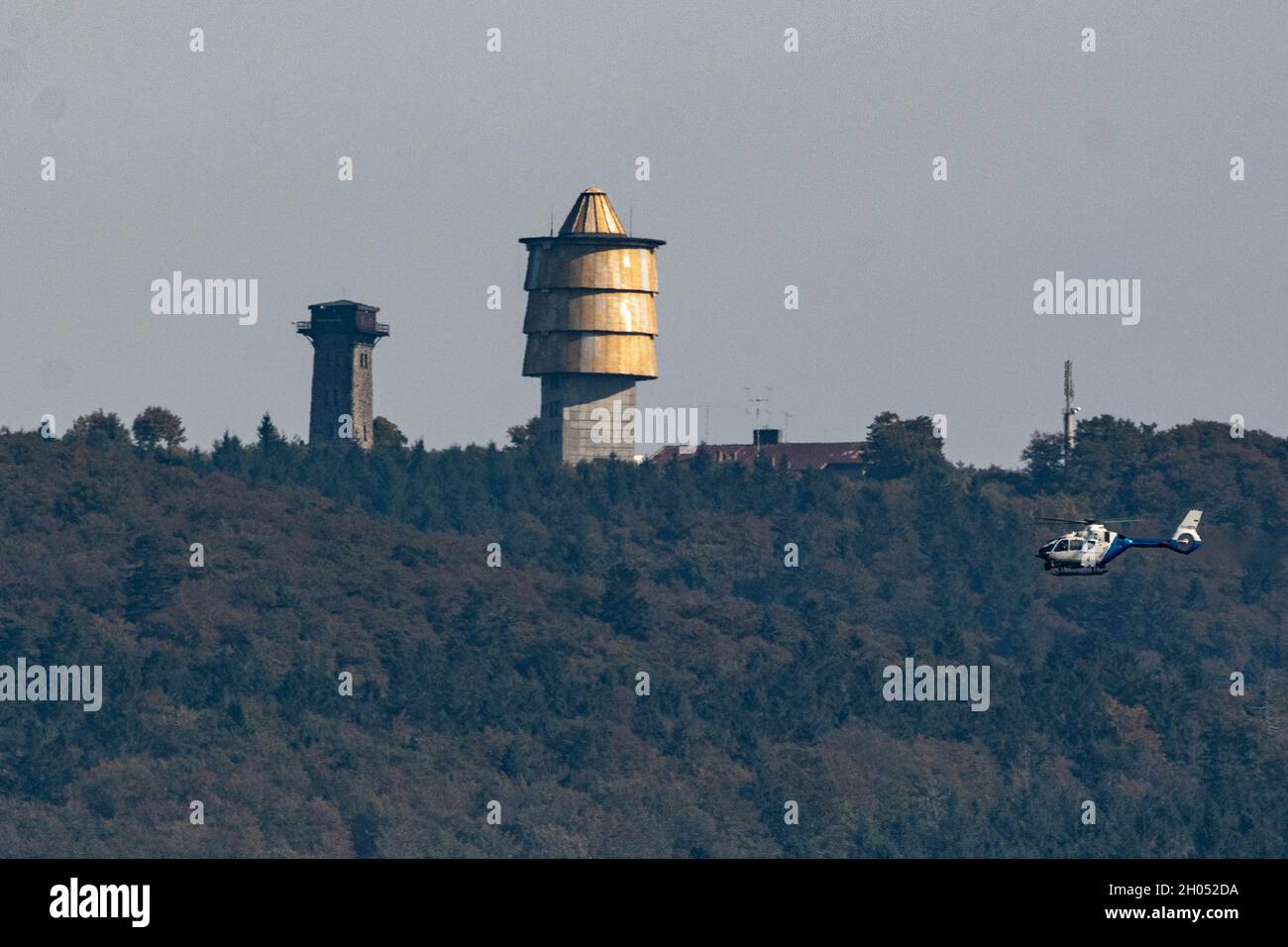 11 October 2021, Bavaria, Waldmünchen: A helicopter is used to search ...