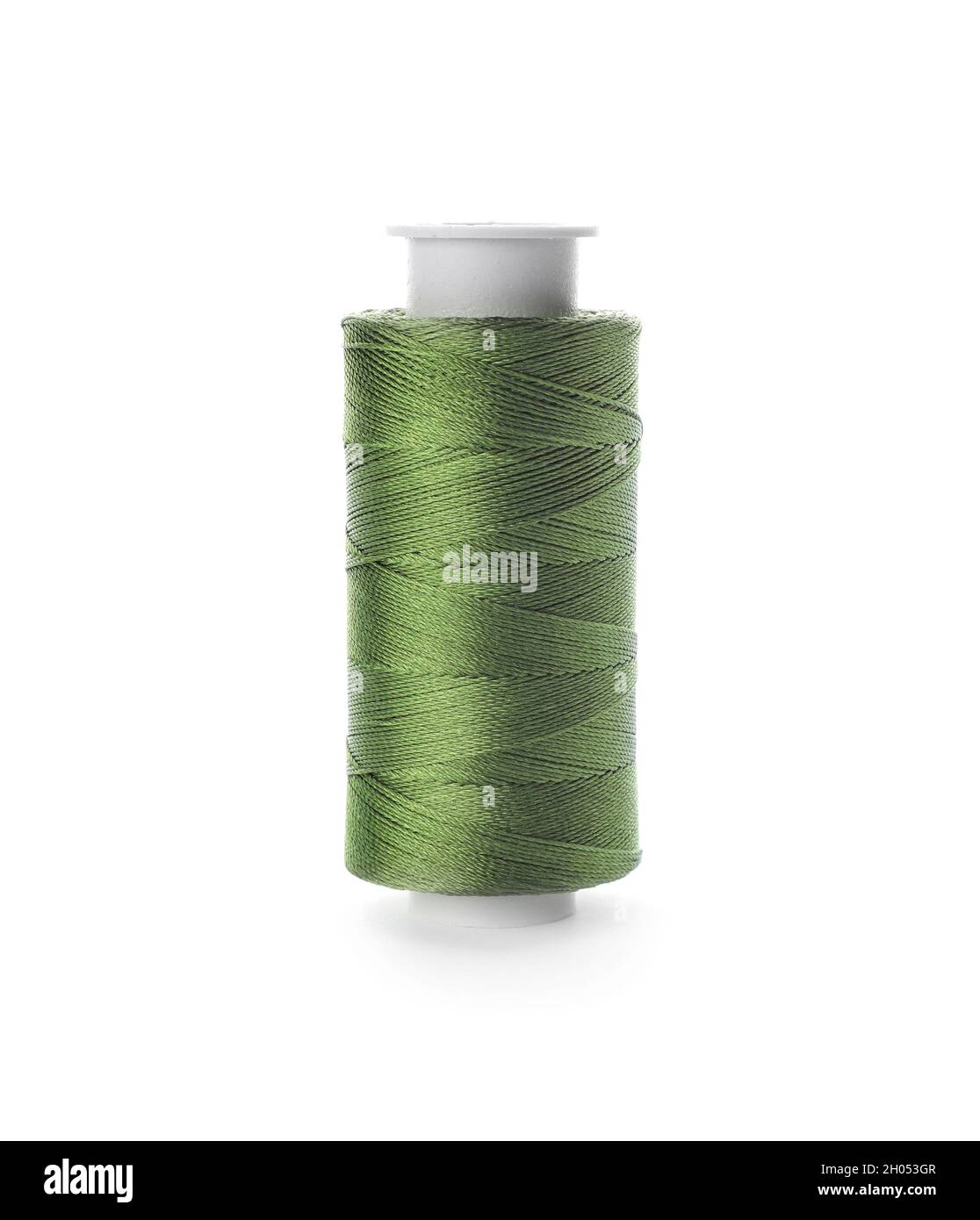 Color sewing thread on white background Stock Photo - Alamy