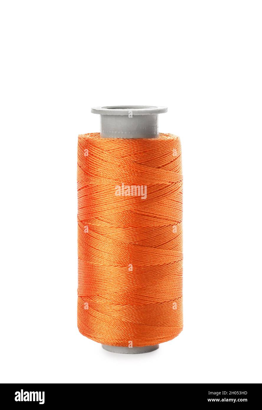 Color sewing thread on white background Stock Photo - Alamy