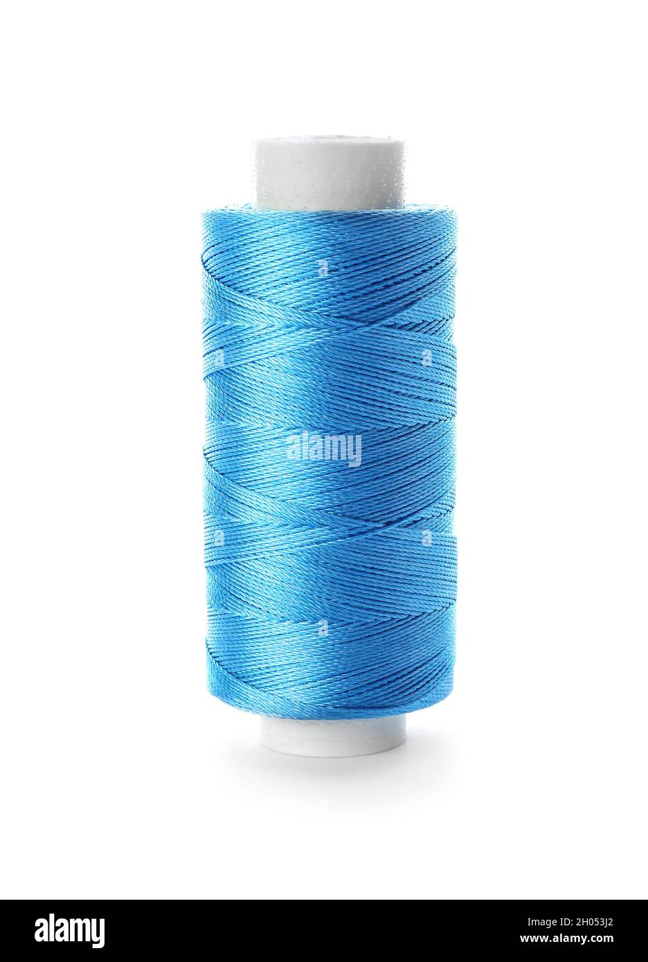 Color sewing thread on white background Stock Photo - Alamy