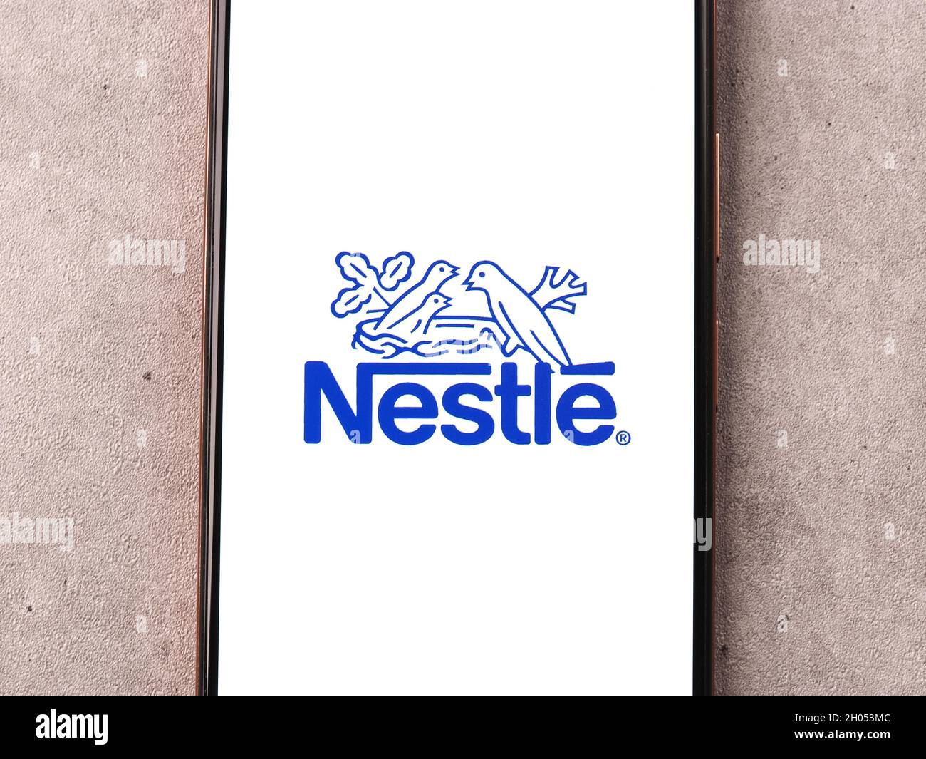 West Bangal, India - October 09, 2021 : Nestle logo on phone screen ...