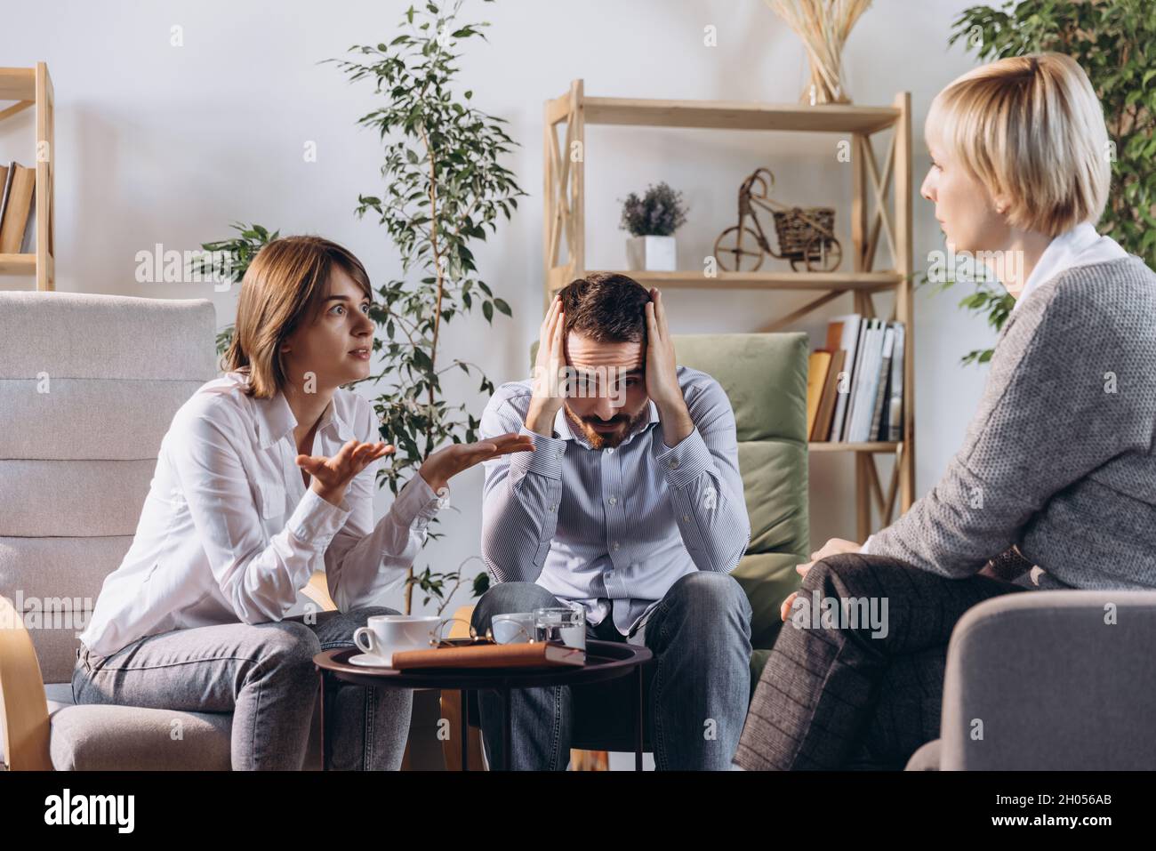 Unhappy married couple, sad, depressed man and woman meeting with ...