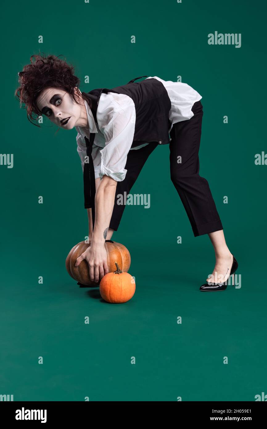 Full-length portrait of artistic woman in movie character costume ...
