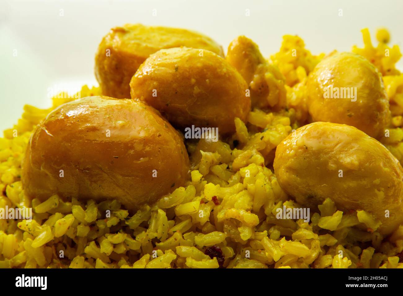 Detail of a rice dish with pequi Stock Photo - Alamy