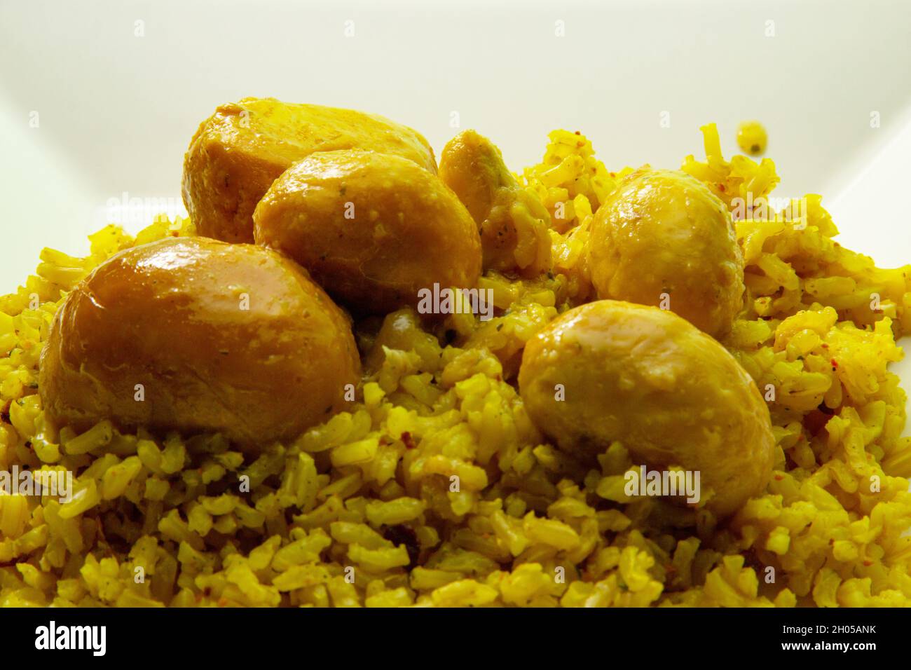 Detail of a rice dish with pequi Stock Photo - Alamy