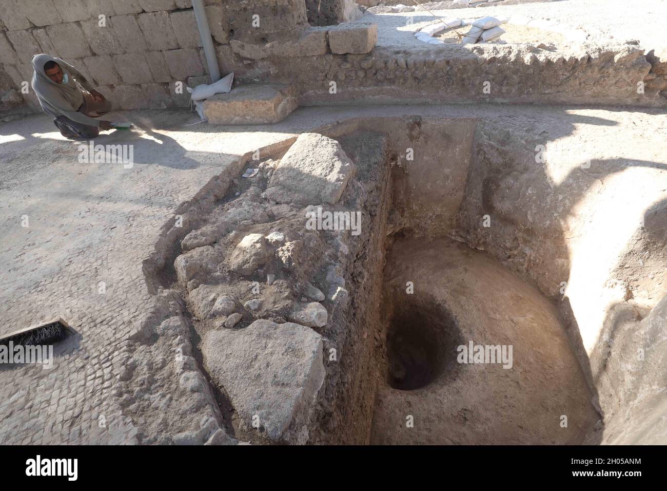 YAVNE, Oct. 11, 2021 (Xinhua) -- A worker operates at the excavation ...