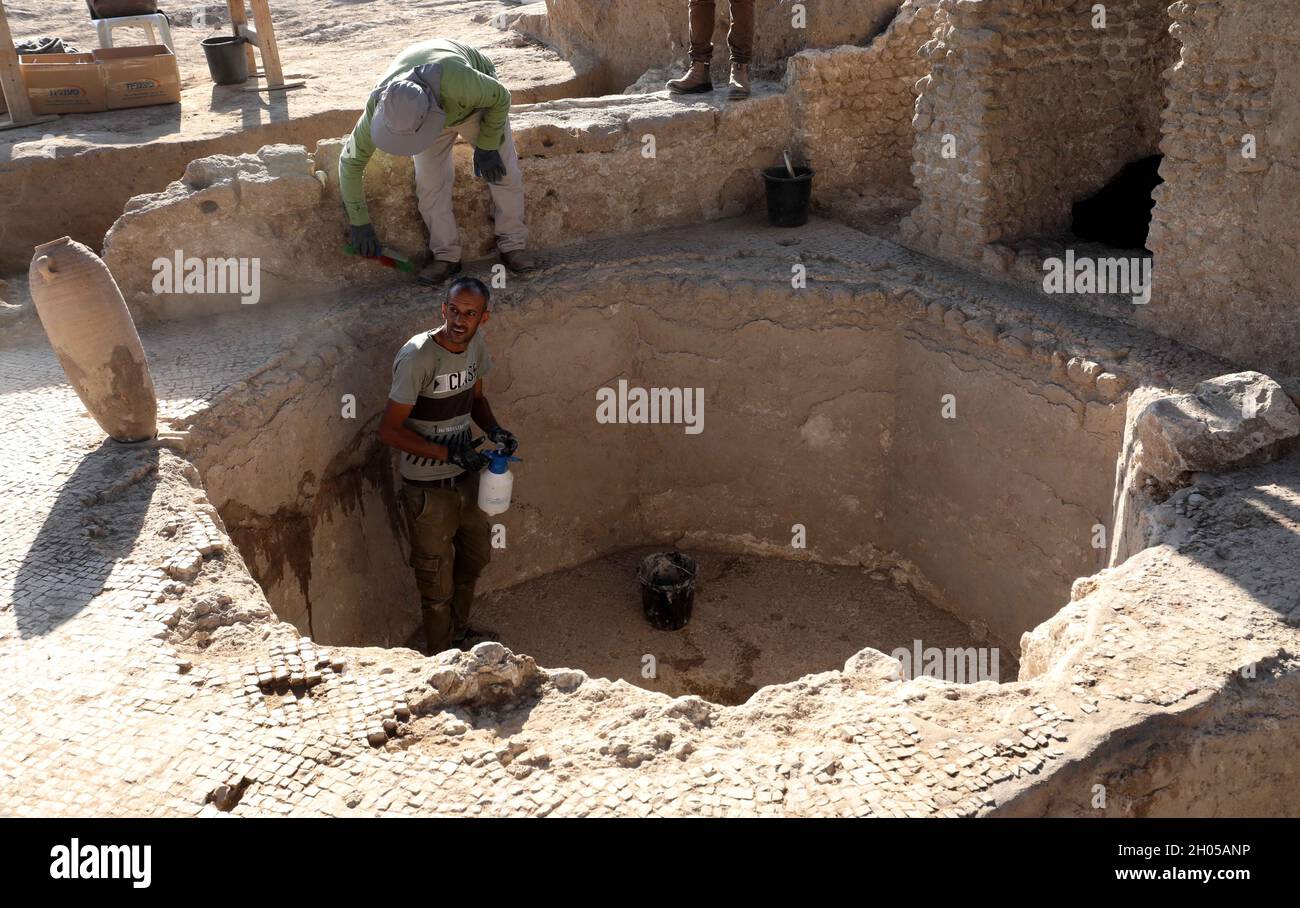 YAVNE, Oct. 11, 2021 (Xinhua) -- Workers operate at the excavation site ...