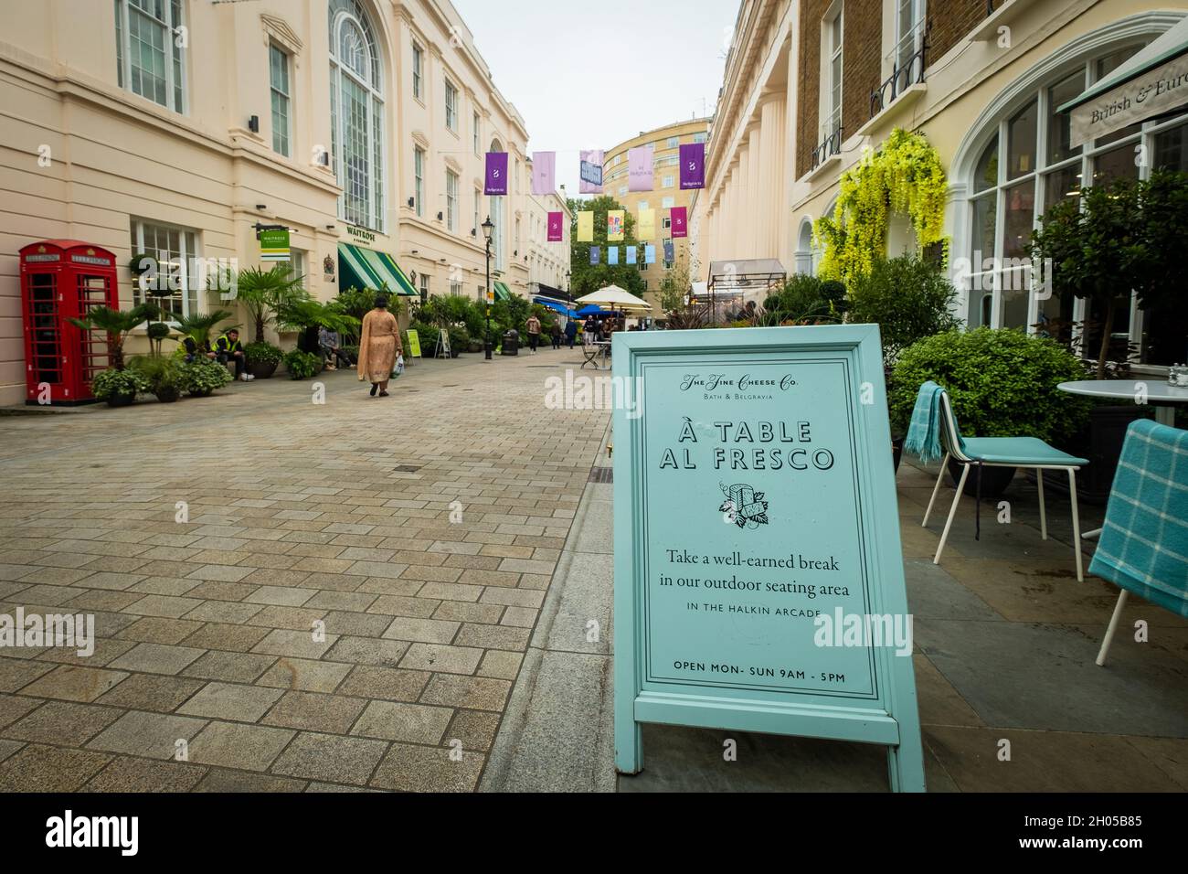 London October 2021: Shoppers on Motcomb Street in Knightsbridge, an ...