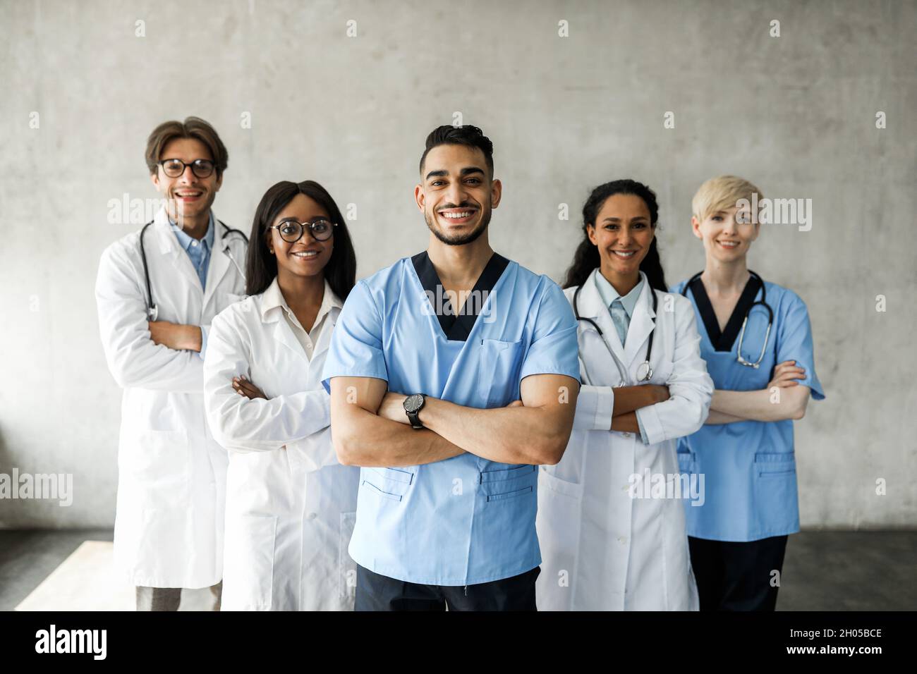 Group doctors standing together cross hi-res stock photography and ...